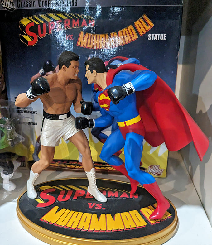 The Superman versus Muhammad Ali statue captures one of comics' most legendary crossovers, because apparently even the Man of Steel needed boxing lessons from The Greatest.