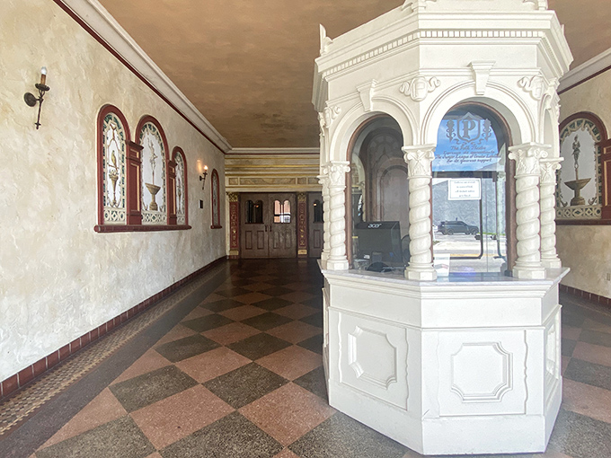 The hexagonal ticket booth stands like a time machine portal &ndash; hand over modern currency and receive passage to an era when entertainment was an occasion.