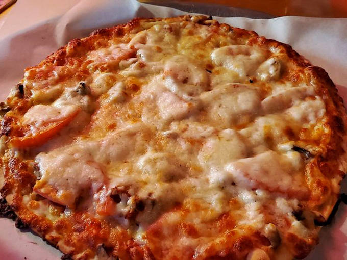 Simple yet sublime, this tomato and mushroom pizza demonstrates that sometimes less is more &ndash; especially when "less" still covers every delicious inch.