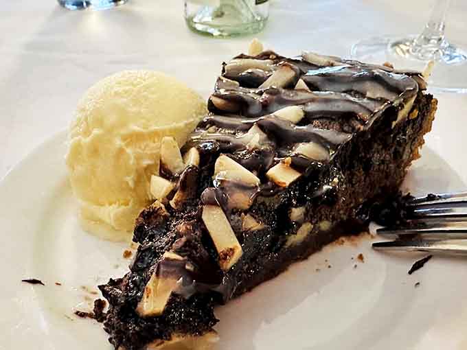 This triple chocolate fudge pie with ice cream isn't just dessert &ndash; it's therapy on a plate, rich and decadent beyond words.