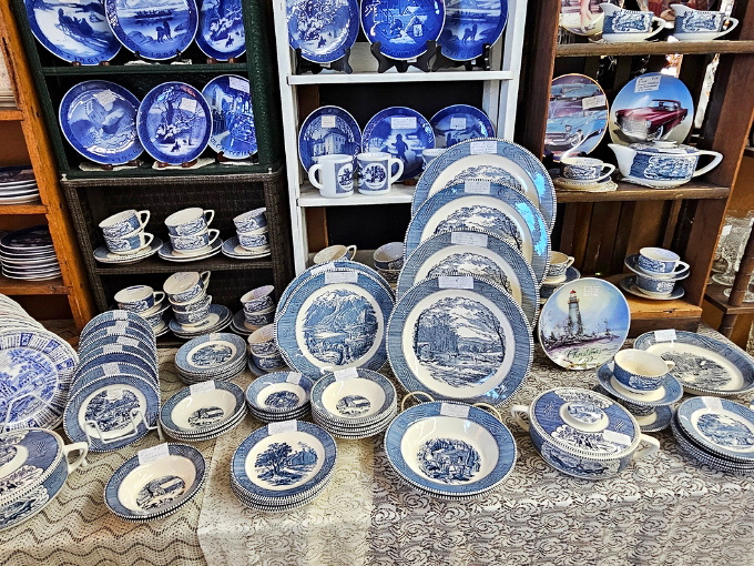 Blue and white dishware creates a ceramic ocean across tables and shelves, each piece carrying echoes of Sunday dinners and holiday gatherings from decades past.