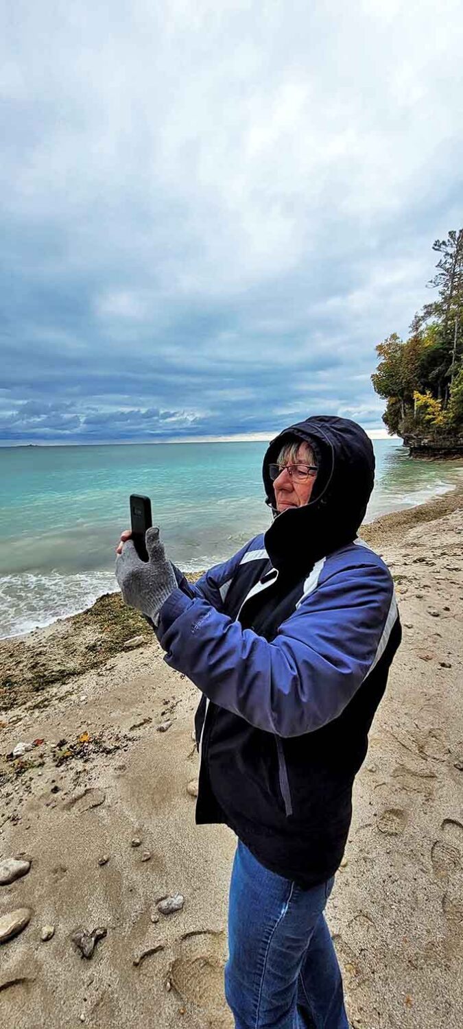 A visitor captures the ever-changing moods of Green Bay's waters, where each photo preserves a moment that will never repeat exactly.