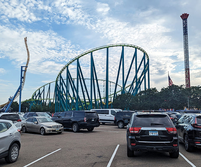 Wild Thing: The park's signature hypercoaster commands the skyline like a teal dragon, promising riders the ultimate combination of height, speed, and regrettable screaming.