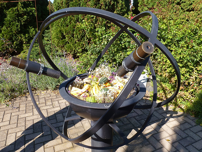 This cosmic garden sculpture looks like something Einstein might have designed if he'd traded physics for horticulture &ndash; science meets art.