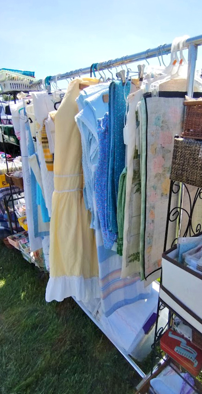 Delicate vintage linens and dresses, each stitch representing hours of craftsmanship from a time before fast fashion.