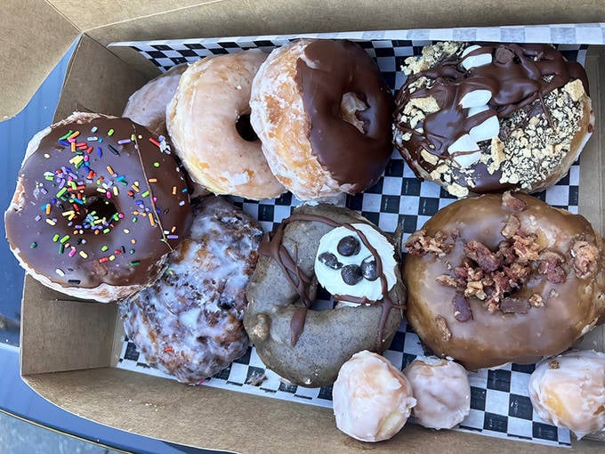 A box of assorted donuts presents the sweet dilemma that has paralyzed decision-making skills since the bakery opened.