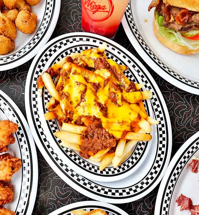 Crispy potatoes swimming beneath a lava flow of savory chili and melted cheese&mdash;not first-date food unless you're testing their worthiness.