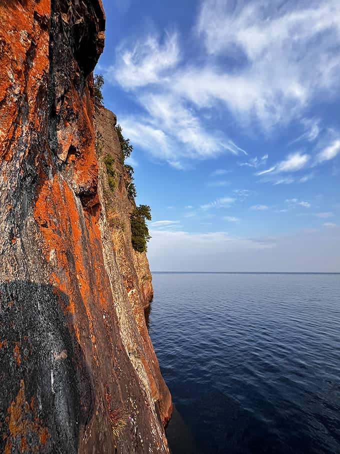 Standing at the precipice where land meets water, visitors experience the exhilarating edge of Minnesota's dramatic coastline.