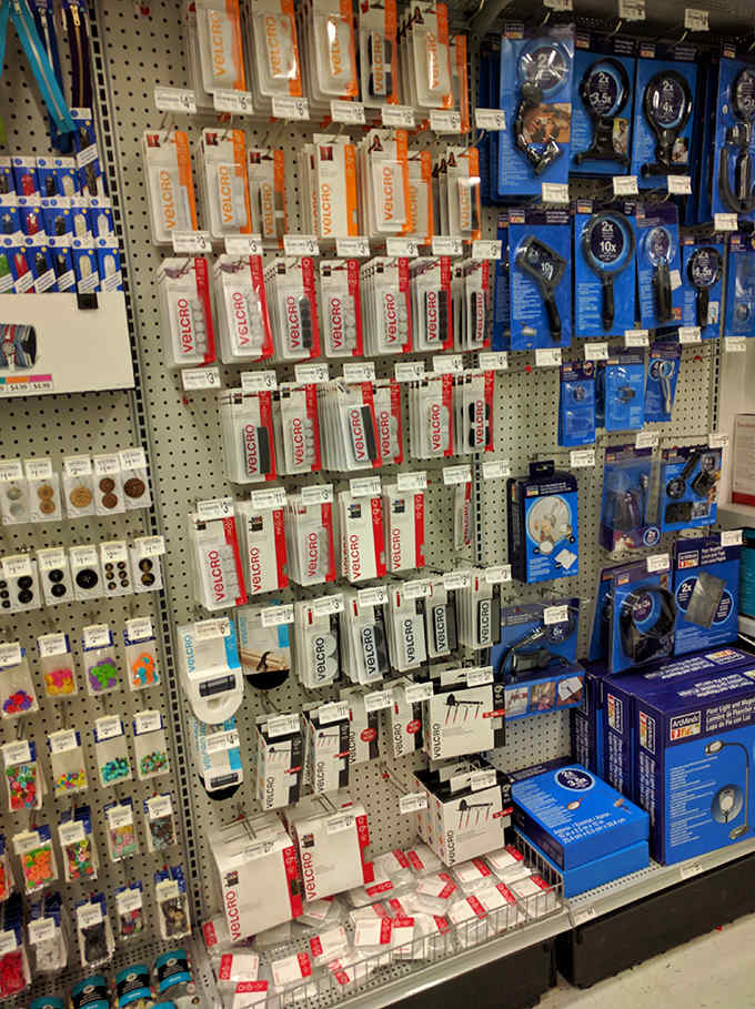 Electronic accessories hang in perfect rows, the hardware behind the heartware of modern crafting, turning digital ideas into tangible treasures.