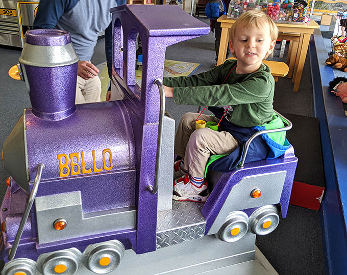 All aboard the purple express! This rideable train delights young conductors who can't contain their excitement as they embark on stationary journeys fueled by imagination.