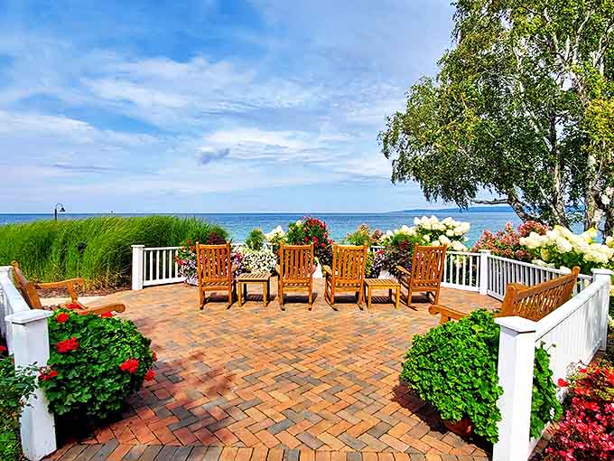 The lakefront patio combines comfortable seating with botanical beauty &ndash; nature's perfect frame for those endless water views.