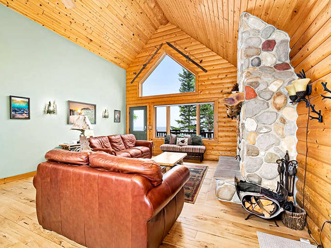 The formal living room's fireplace, antique furniture, and rich textiles showcase the Victorian talent for creating spaces both beautiful and functional.