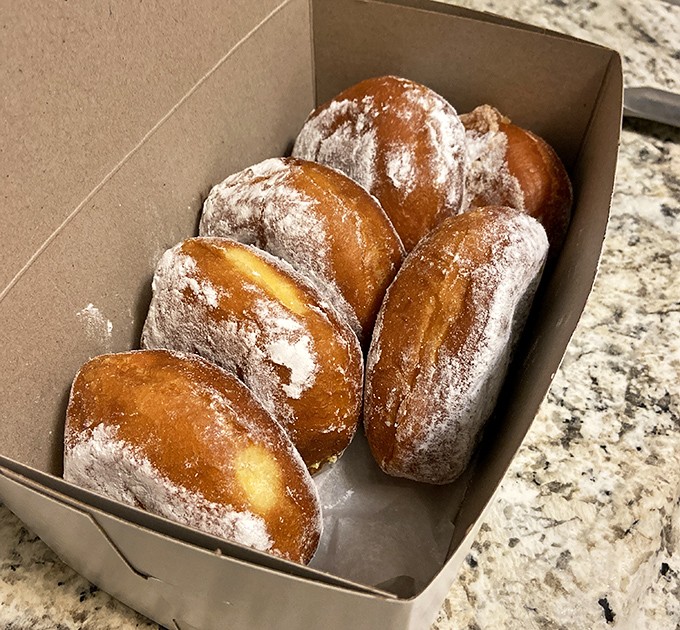 Pączki season brings these Polish pastry treasures &ndash; plump, powdered spheres hiding sweet fillings that make waiting in line completely worth it.