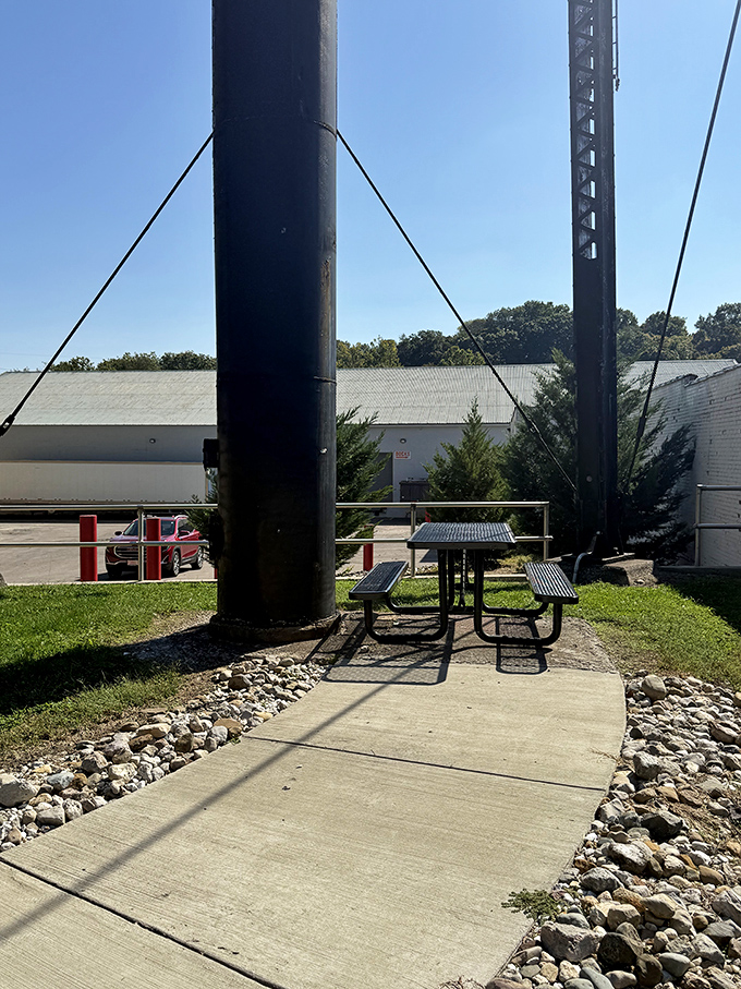 A peaceful picnic spot at the base of the tower lets visitors relax while admiring this quirky piece of Americana.