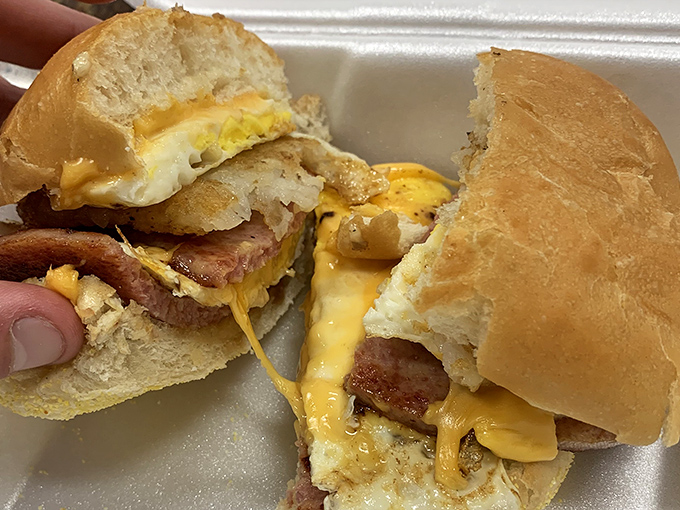 The holy trinity of breakfast: pork roll, egg, and cheese nestled on a fresh roll – simplicity that somehow tastes like complexity.