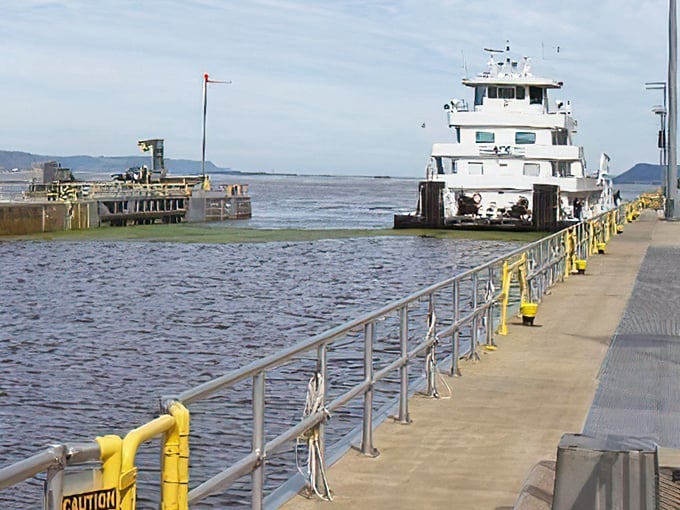 A Mississippi River ferry awaits passengers, continuing the centuries-old tradition of connecting Wisconsin's shores with neighboring states.