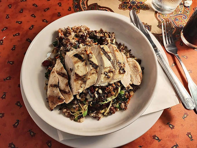 Healthy meets hearty in this quinoa bowl topped with grilled chicken &ndash; proof that nutritious food doesn't have to sacrifice flavor.