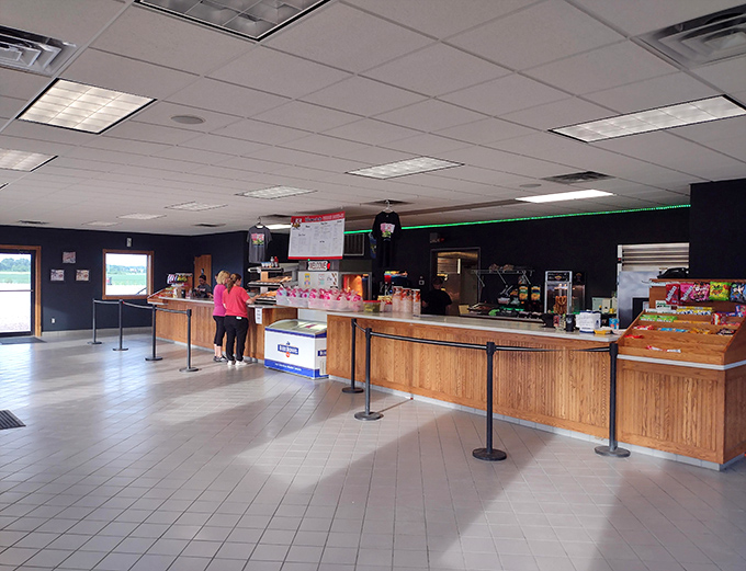 The concession stand &ndash; temple of movie snacks where popcorn is baptized in butter and memories are made between features.