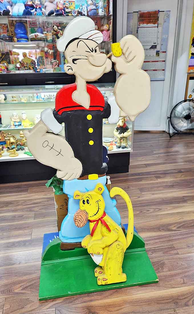 Life-size Popeye standees offer perfect photo opportunities, bringing the beloved sailor into three-dimensional reality for delighted visitors of all ages.