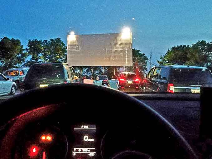 "Good Evening Folks!" The welcoming message flashes across the screen, setting the tone for a night of community and shared entertainment.