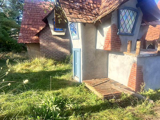 A tiny blue door that seems to whisper, "Come closer and imagine who might live behind me."