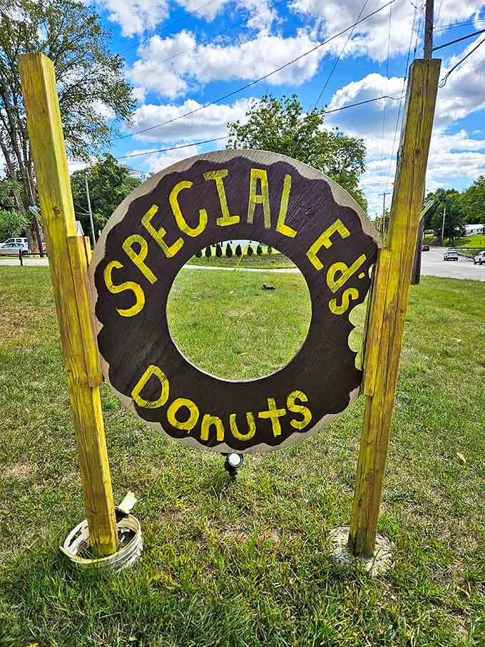 Simple, rustic, and straight to the point – this wooden donut sign is the X that marks the spot.