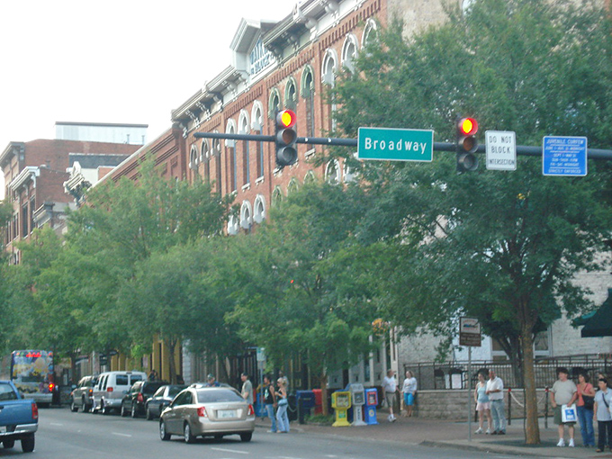Broadway Street in Chillicothe buzzes with activity under a canopy of trees, where shopping, dining, and history create the perfect small-city experience.