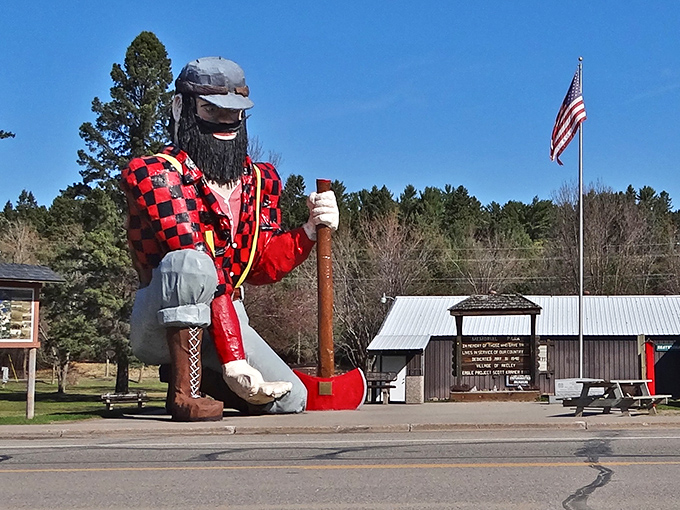 Minnesota's most famous lumberjack looms large against the sky, offering his hand to visitors brave enough to climb up for an unforgettable photo opportunity.