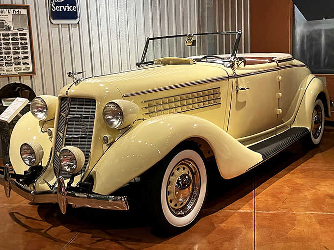 The 1935 Auburn 851 Supercharged Cabriolet represents an era when cars were moving sculptures, its flowing fenders and elegant proportions stopping visitors in their tracks.