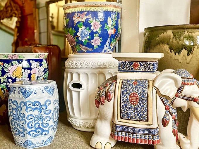 Porcelain elephants and blue-and-white ceramics create a global conversation, each piece having traveled through time to reach this eclectic haven.