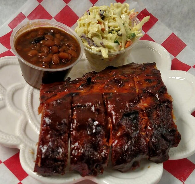 Glistening with sauce and spice, these ribs don't just fall off the bone &ndash; they practically leap into your mouth.