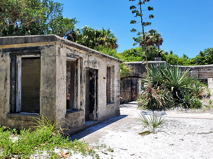 Battery Mellon's weathered ruins offer a fascinating glimpse into Egmont Key's military past during the Spanish-American War era.
