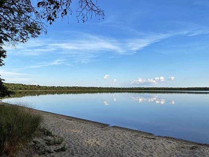 Morning at Glendalough creates a glass-like surface on the water, reflecting clouds with such precision you might accidentally try swimming upward.