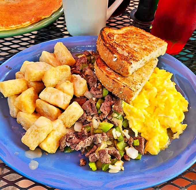 Bistec Criollo with eggs and tostones &ndash; a breakfast plate that makes ordinary bacon and eggs seem like they're not even trying.