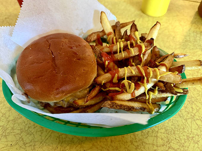 A juicy burger shares plate space with hand-cut fries &ndash; the kind that remind you why fresh potatoes, properly fried, are worth the extra effort.