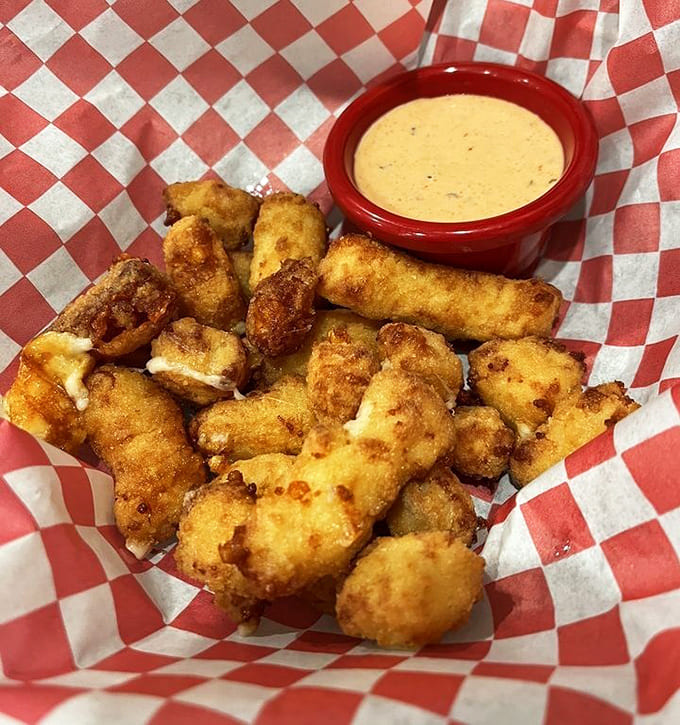 Cheese curds: Little golden nuggets of joy that crunch, then stretch, then make you wonder why you didn't order two baskets.