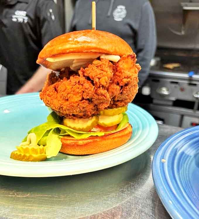 Towering and magnificent, this chicken sandwich demands a two-handed approach and possibly a moment of silent appreciation before diving in.