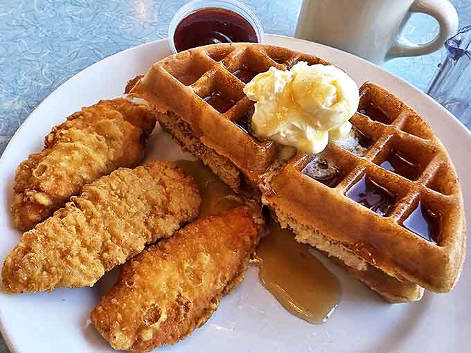 Chicken and waffles: the culinary equivalent of a sweet and savory romance that proves opposites really do attract, especially at breakfast.