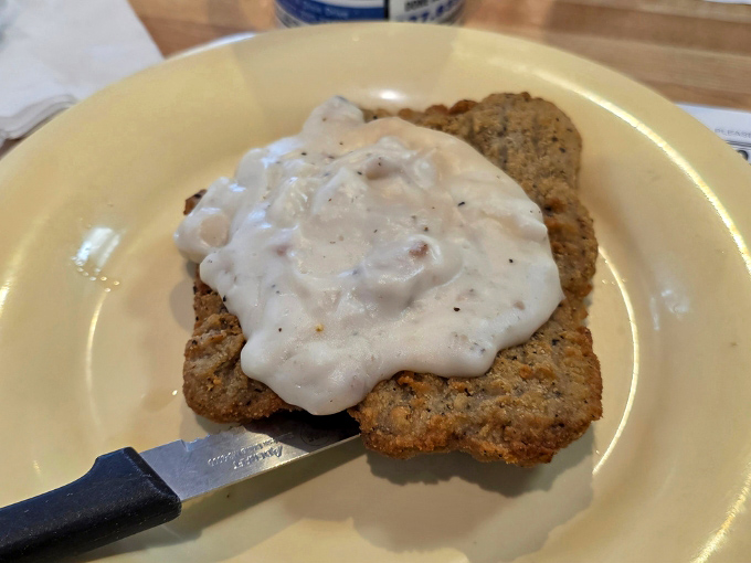 Country-fried steak smothered in gravy that could make even the most sophisticated food critic temporarily forget about foie gras and truffles.