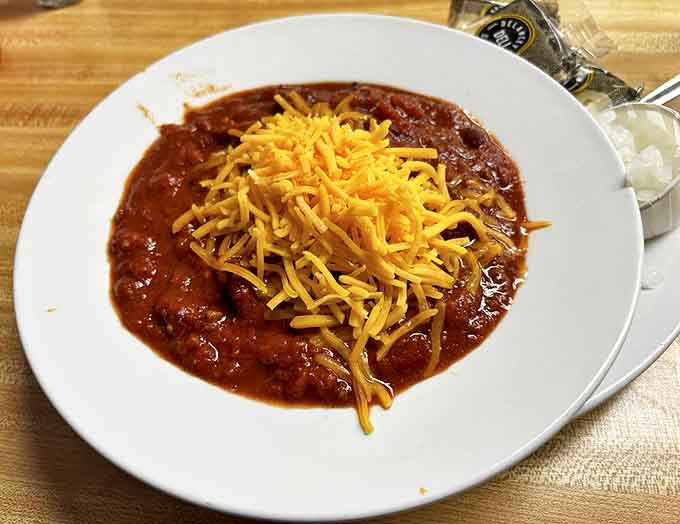 Hearty chili topped with melted cheddar &ndash; the kind of comfort food that makes Minnesota winters slightly more bearable.