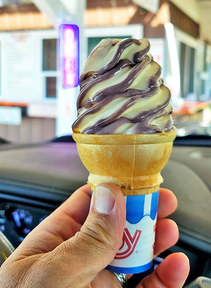 The chocolate-dipped cone &ndash; that perfect spiral of vanilla soft serve wearing a chocolate tuxedo, ready for its grand entrance.