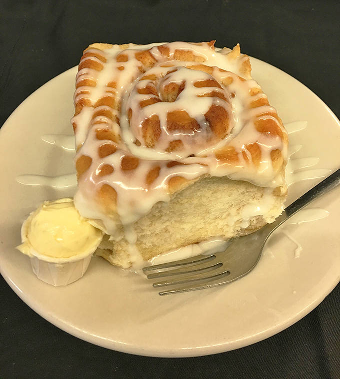 The cinnamon roll&mdash;technically not pie but deserving honorary status&mdash;with cream cheese frosting melting into warm, spiraled perfection.