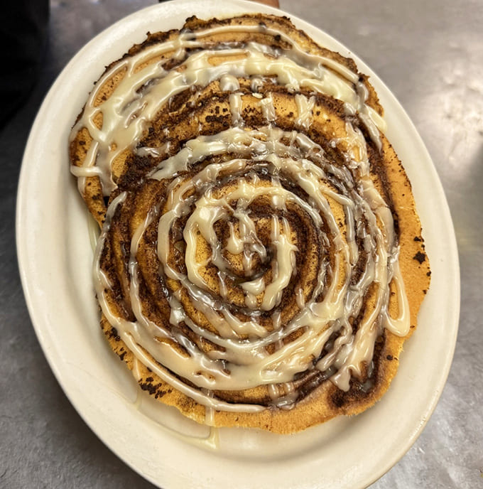 The cinnamon roll pancake &ndash; breakfast's answer to dessert with hypnotic swirls of cinnamon and cream cheese icing melting into every crevice.