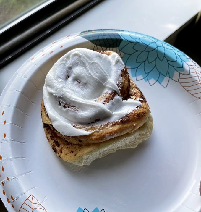 Morning glory in pastry form: a cinnamon roll whose generous frosting melts just enough to create pockets of sugary bliss.