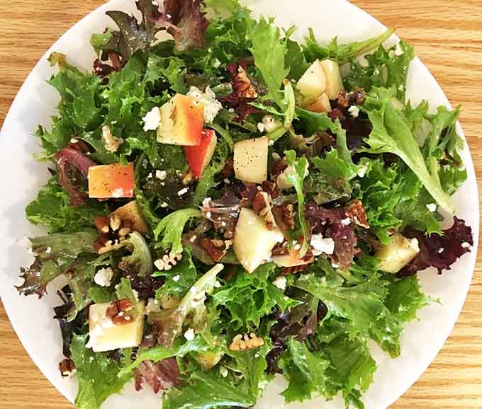 Garden-fresh greens playing host to a party of textures and flavors &ndash; proof that "eating your vegetables" can be a joy.