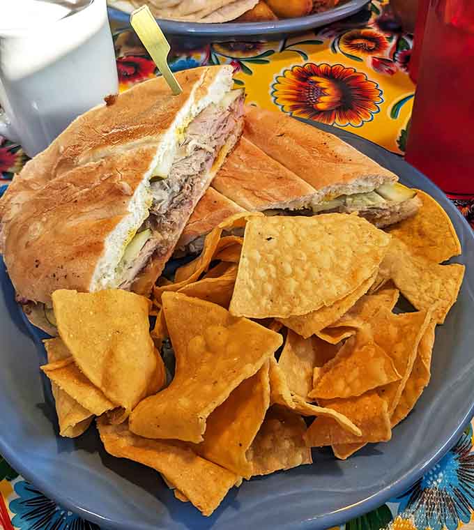 The perfect lunch trifecta &ndash; a pressed Cubano sandwich with crispy house-made chips that'll make you forget all other sandwiches exist.