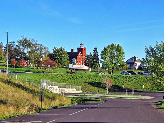 The lighthouse commands attention from every angle, its distinctive architecture a testament to Great Lakes maritime history and engineering.