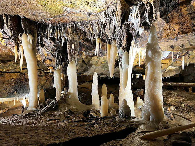 Massive columns and flowing formations create an otherworldly landscape that cameras struggle to capture but memories never forget.