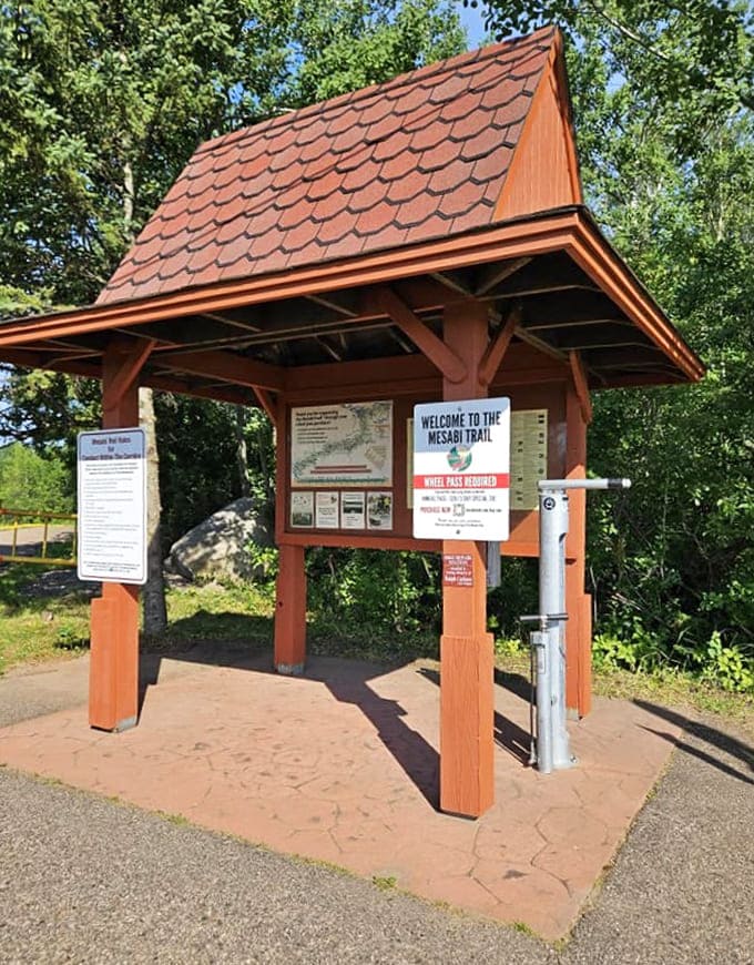 The trail's information kiosk stands like a friendly sentinel, offering maps and guidance before sending adventurers off into Minnesota's breathtaking wilderness.