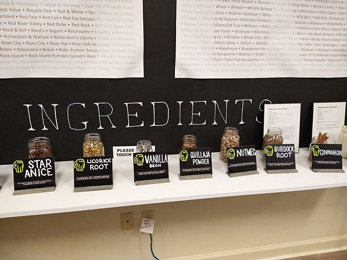 The "ingredients wall" demystifies root beer's complex flavor profile with jars of star anise, vanilla beans, and other aromatic components.